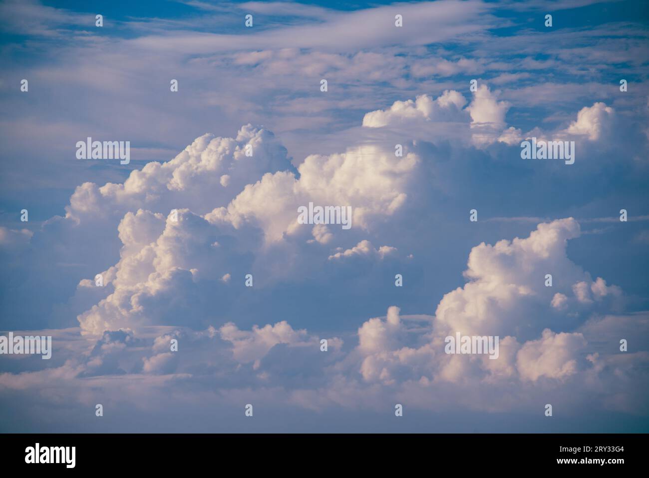 Blue sky and unpredictable white clouds. Amazing nature. Unveiling the ...