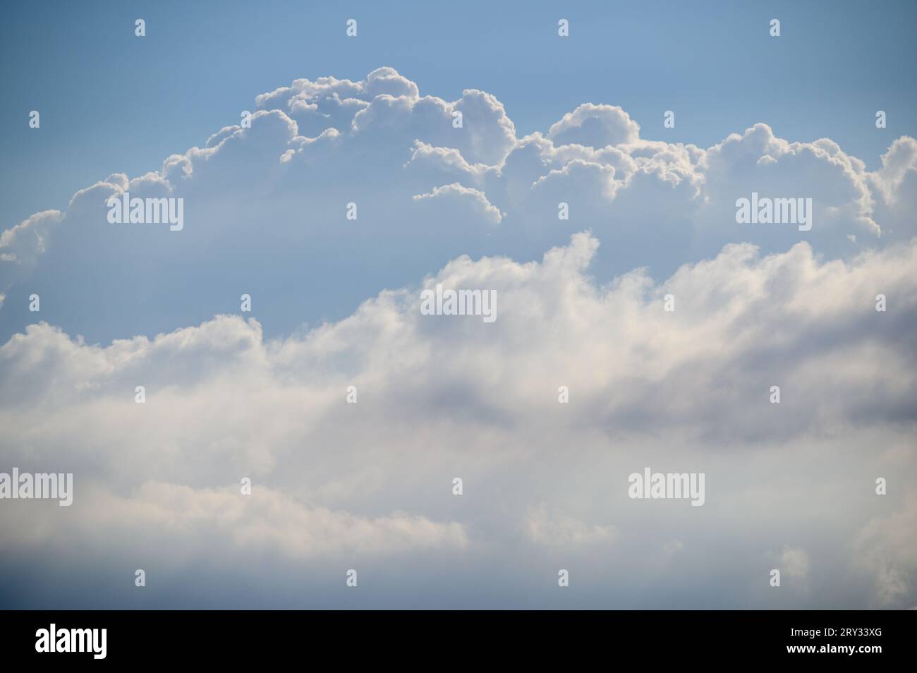 Blue sky unpredictable white clouds hi-res stock photography and images ...