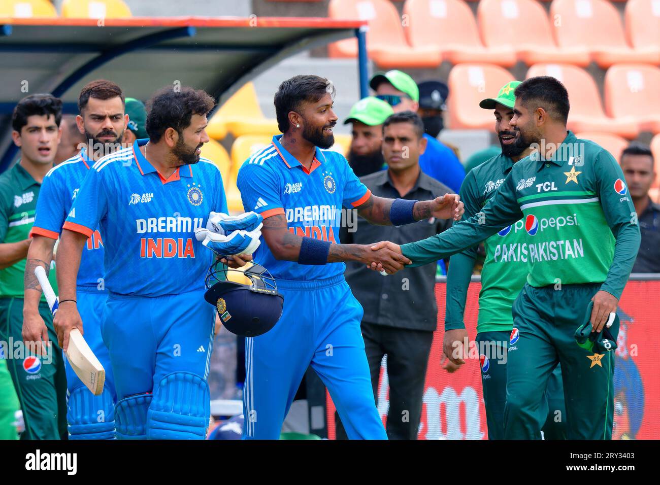 India's Hardik Pandya and Babar Azam of Pakistan hand shakes before the start of the Asia Cup ...