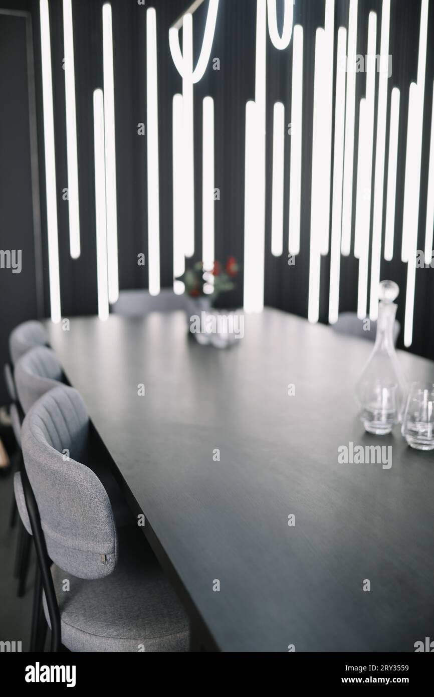 Modern conference room with furniture. Table in empty corporate ...