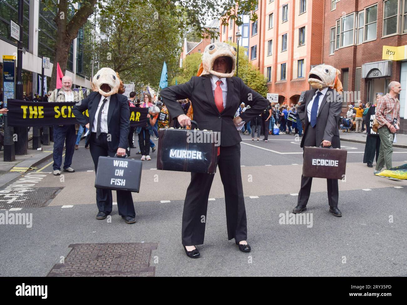 London, England, UK. 28th Sep, 2023. Activists wearing fish masks stage ...
