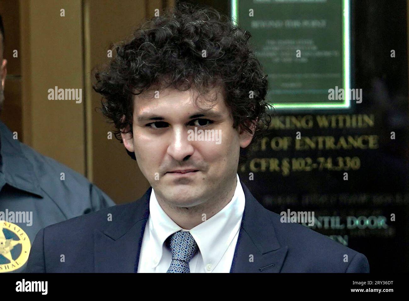 FILE - FTX founder Sam Bankman-Fried leaves Manhattan federal court ...