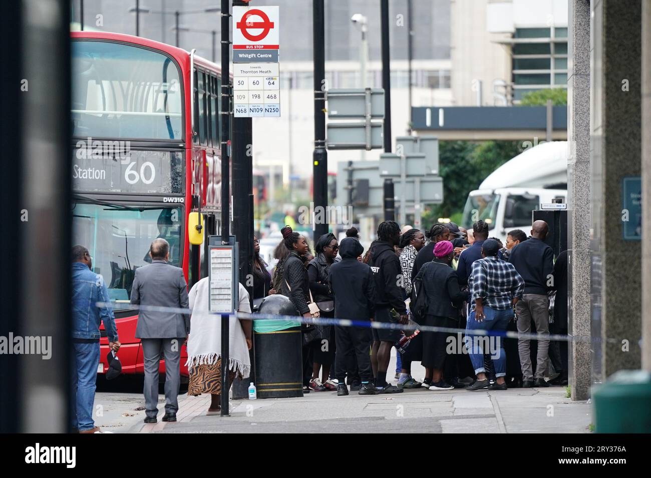 Family and friends of Elianne Andam at the scene in Croydon, south ...