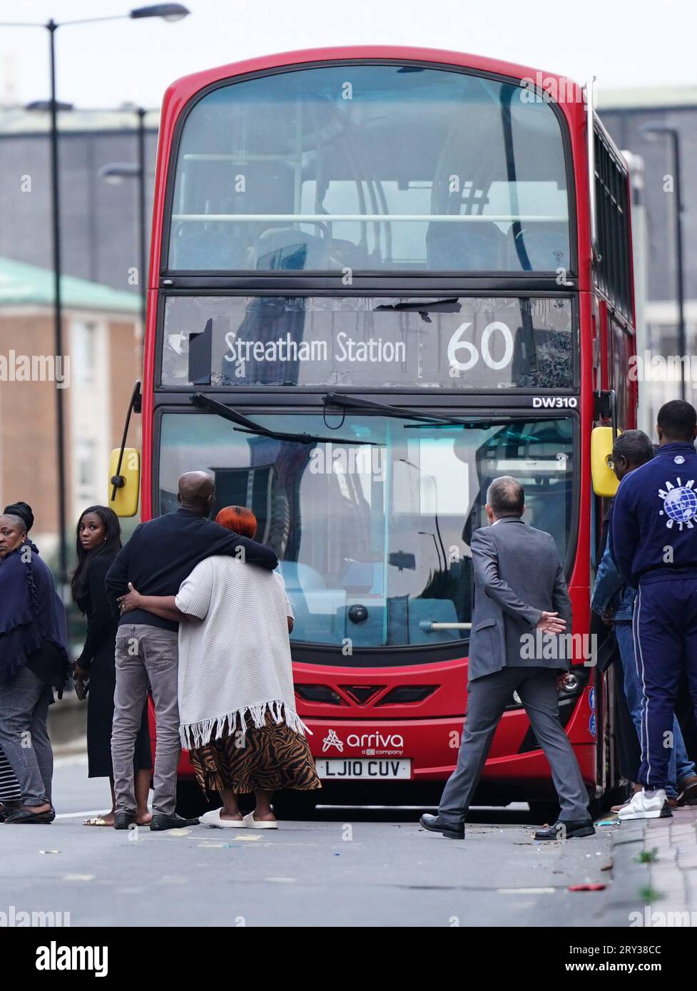Family and friends of Elianne Andam at the scene in Croydon, south ...
