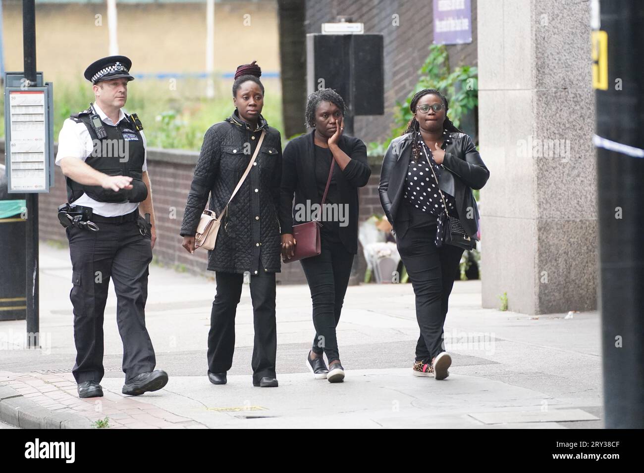 Family and friends of Elianne Andam at the scene in Croydon, south ...