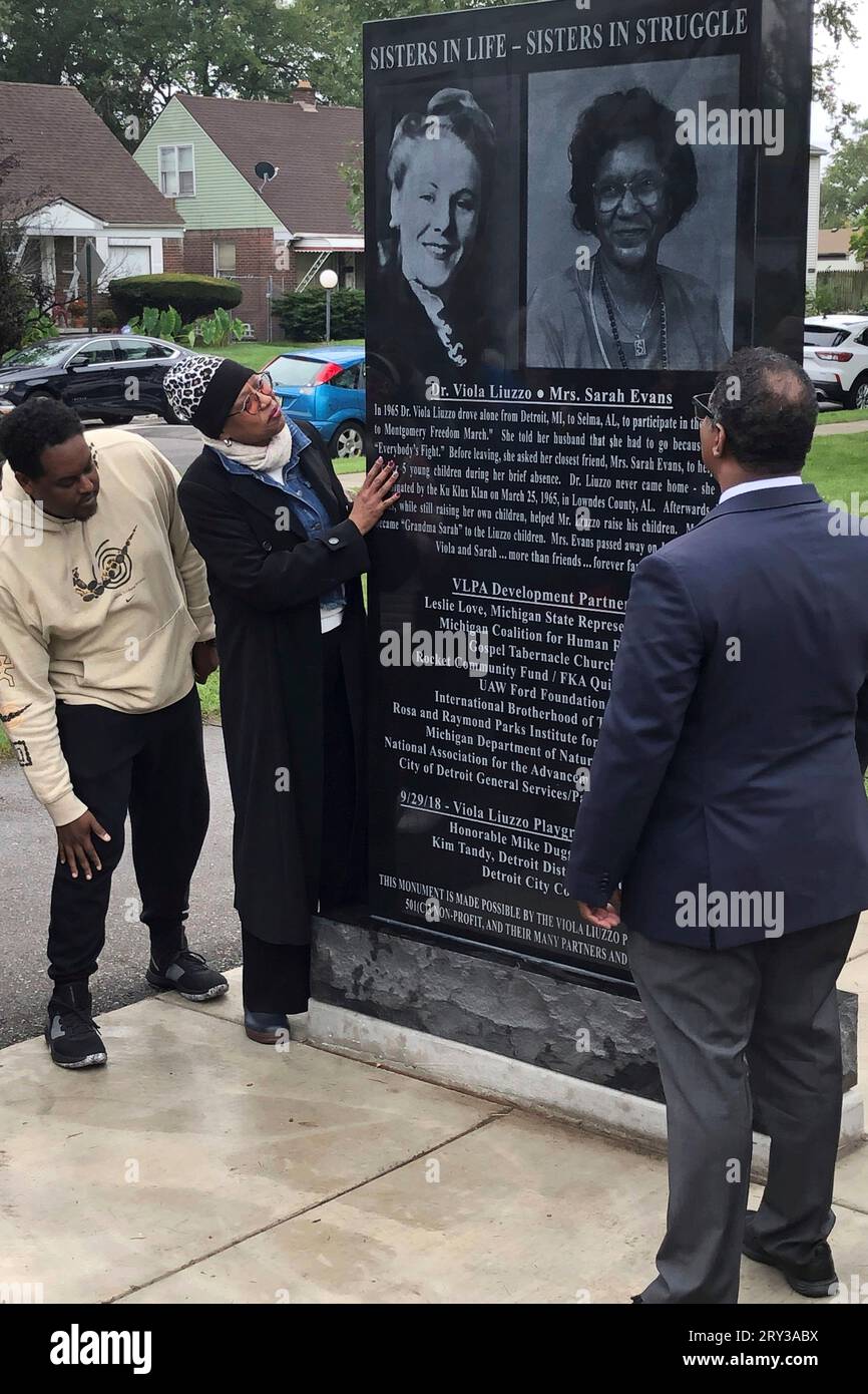 From left, relatives of Sarah Evans and Detroit Deputy Mayor Todd ...
