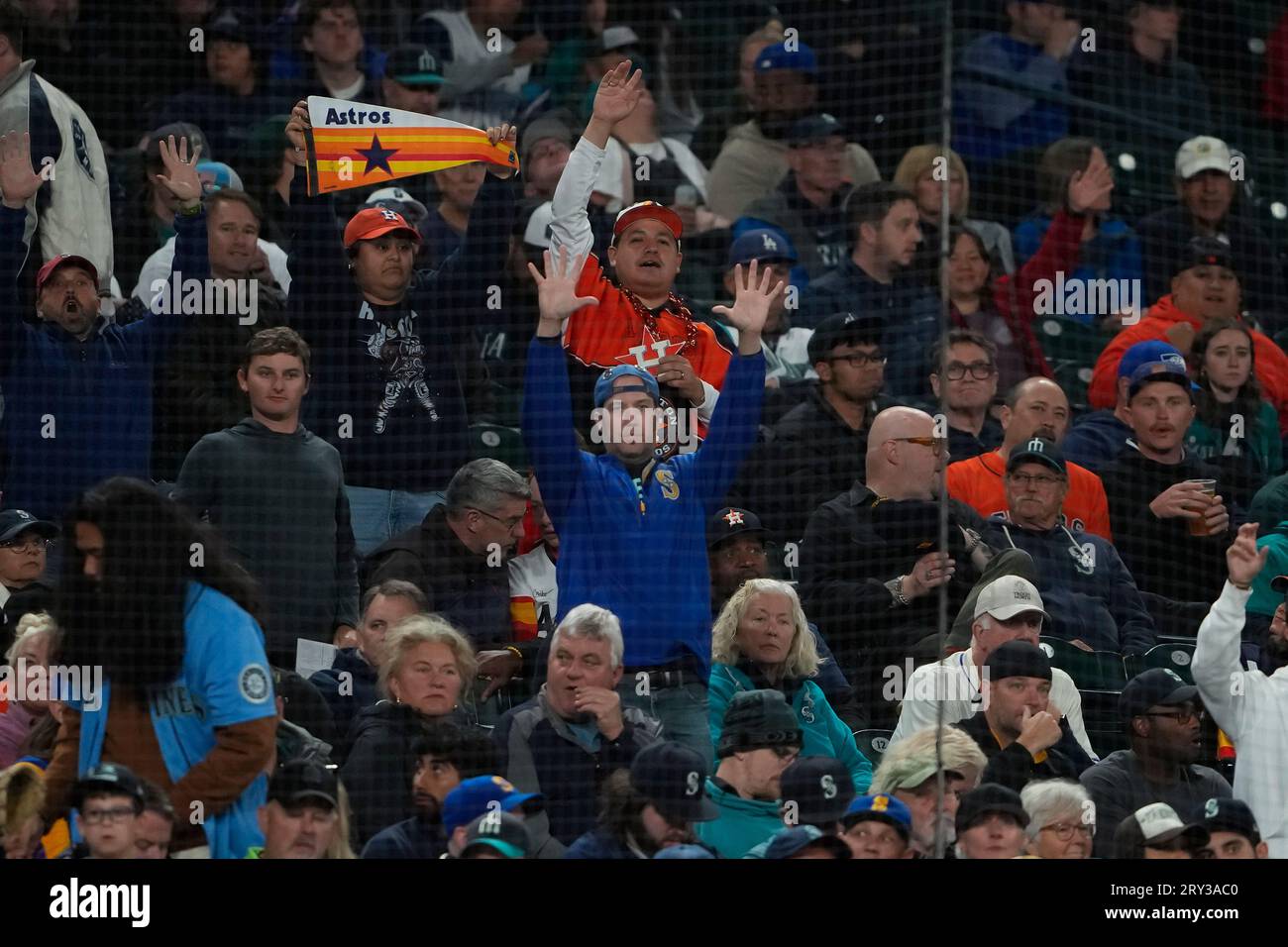 Houston Astros and Seattle Mariners fans react in a baseball game ...
