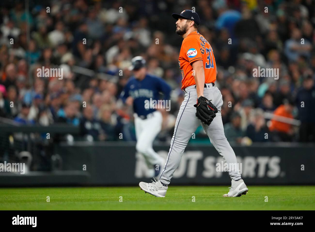 Houston Astros relief pitcher Kendall Graveman walks off the field during a baseball game ...