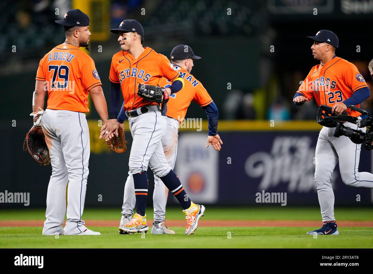 From left, Houston Astros' Jose Abreu (79) greets Mauricio Dubon, as ...