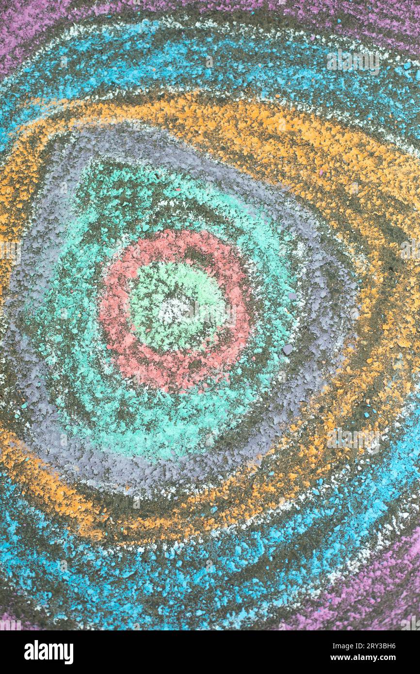 Drawing with chalk on pavement. Colored circles. Bright background ...
