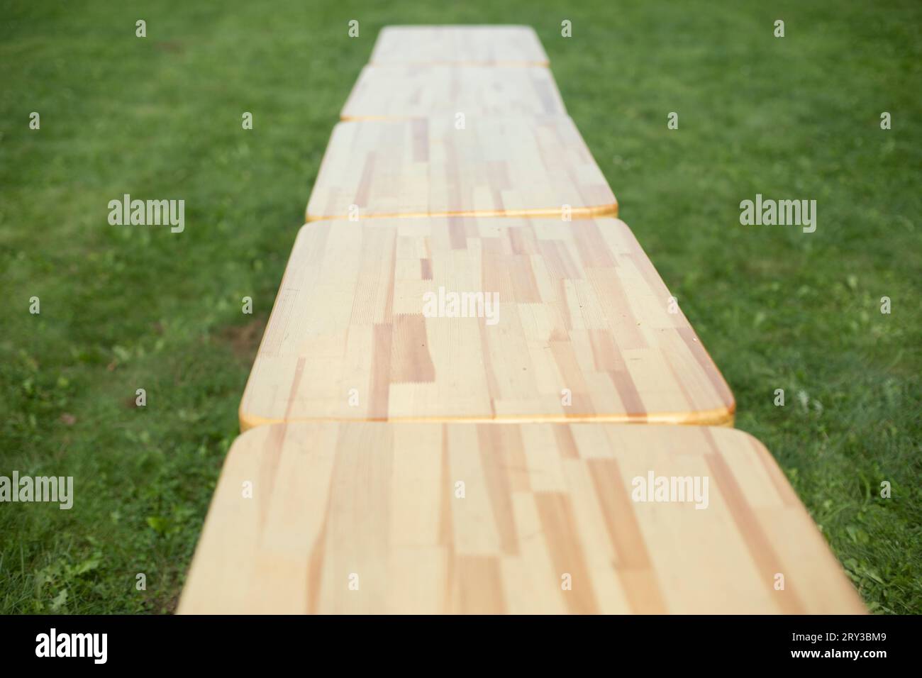 A table made of wood on the street. Furniture in the park. A place to ...