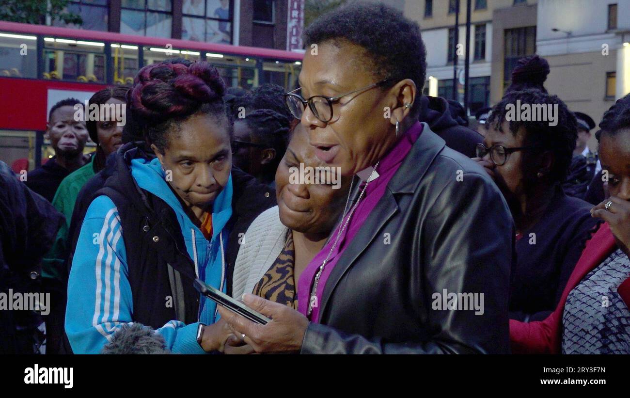 A church leader on behalf of the family reads out a statement near gthe ...