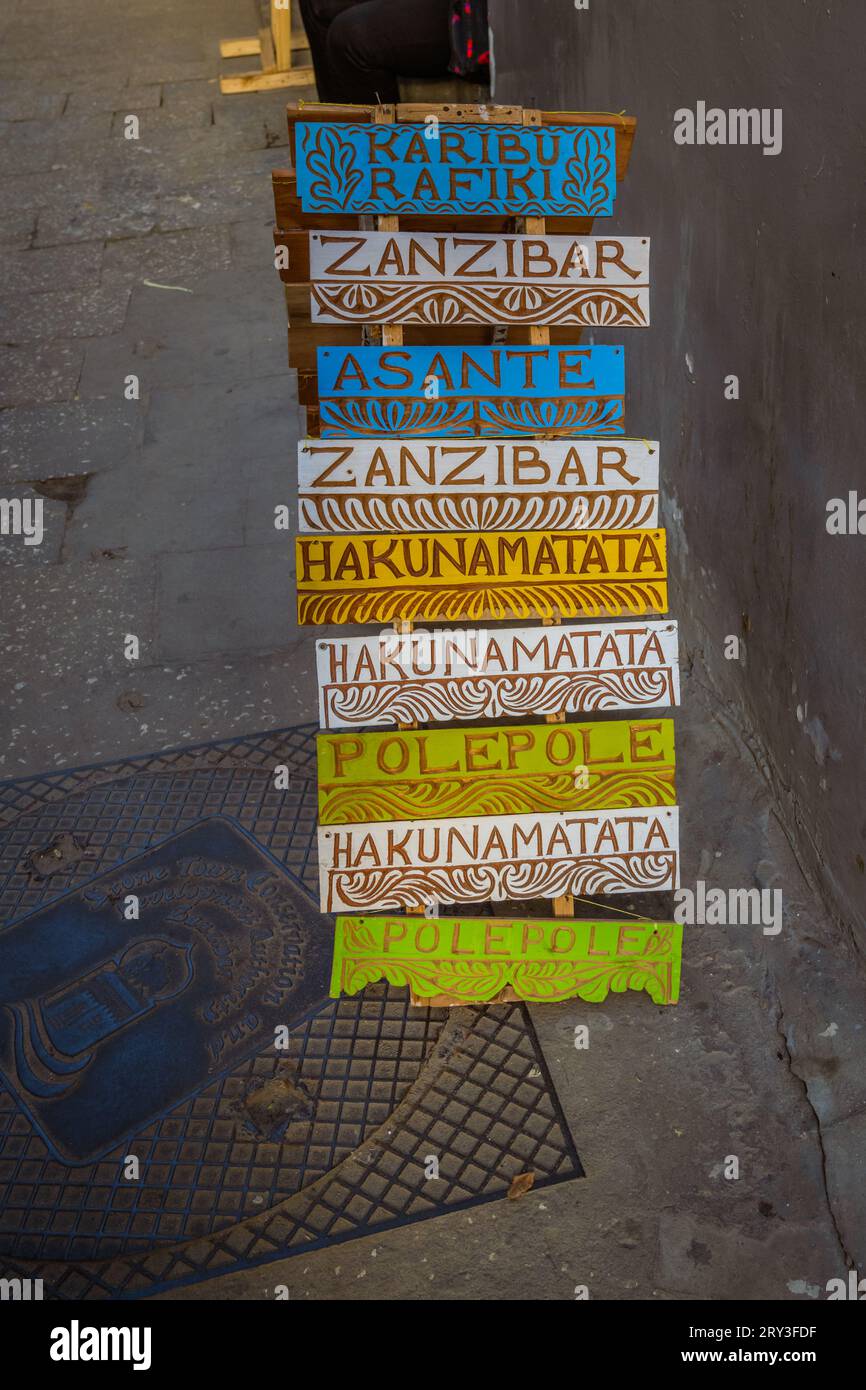 Souvenir plaques plates signs with traditional catch phrases in Suahili ...