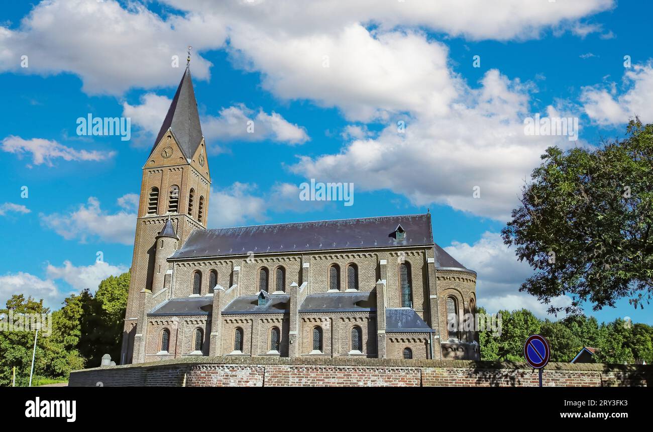 Ancient dutch church in rural village in summer - Linne (St. Martinus ...
