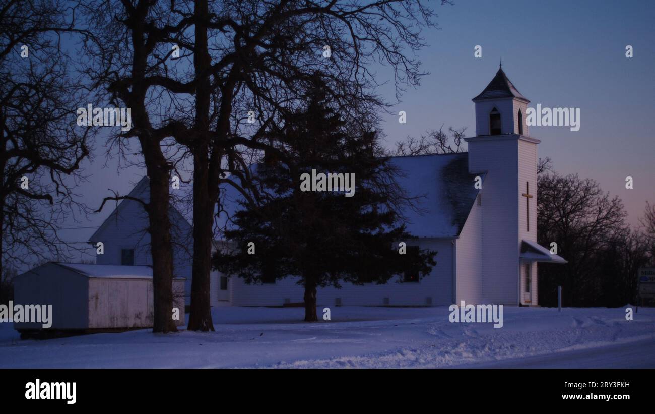 Rural midwestern church with freshly fallen snow on a clear evening at ...
