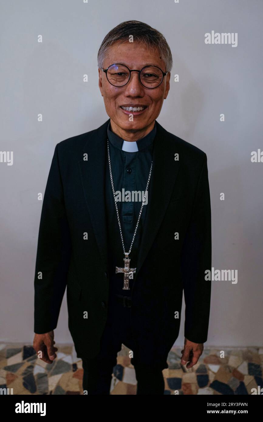 Cardinal-elect, Hong Kong Bishop Stephen Chow poses for photos during a ...