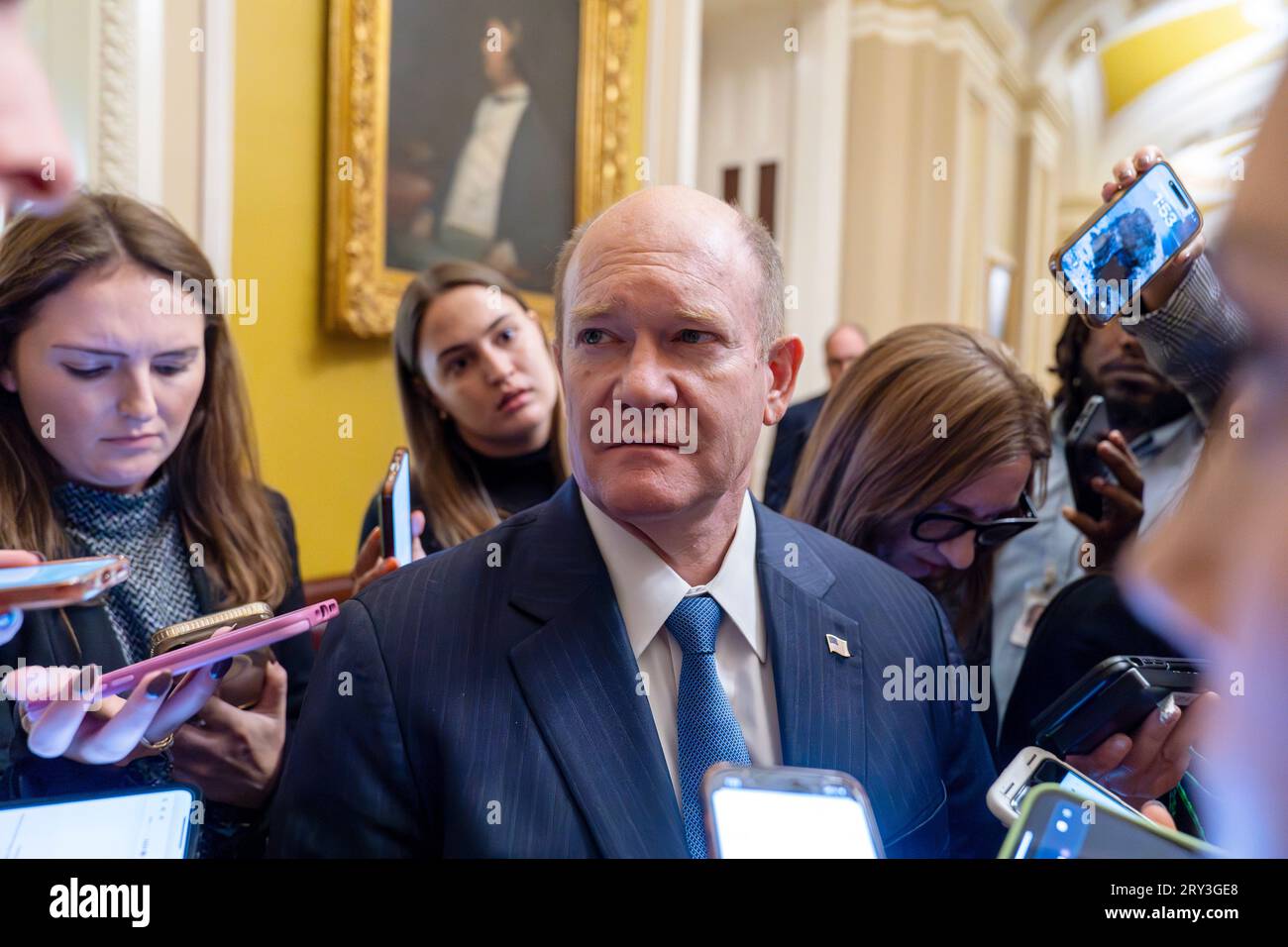 Sen. Chris Coons, D-Del., speaks with reporters after a closed-door ...