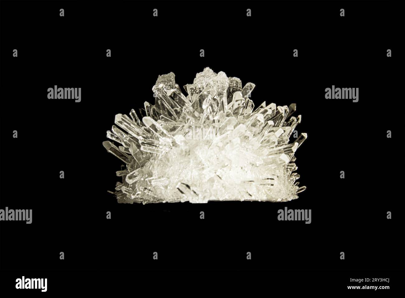 Shiny cream sharp diamond crystal highlighted and isolated on black ...