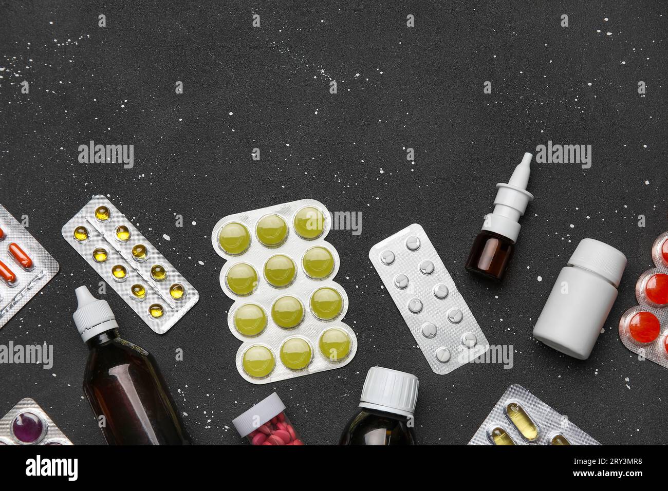 Different pills and bottles of medicines on black background Stock ...