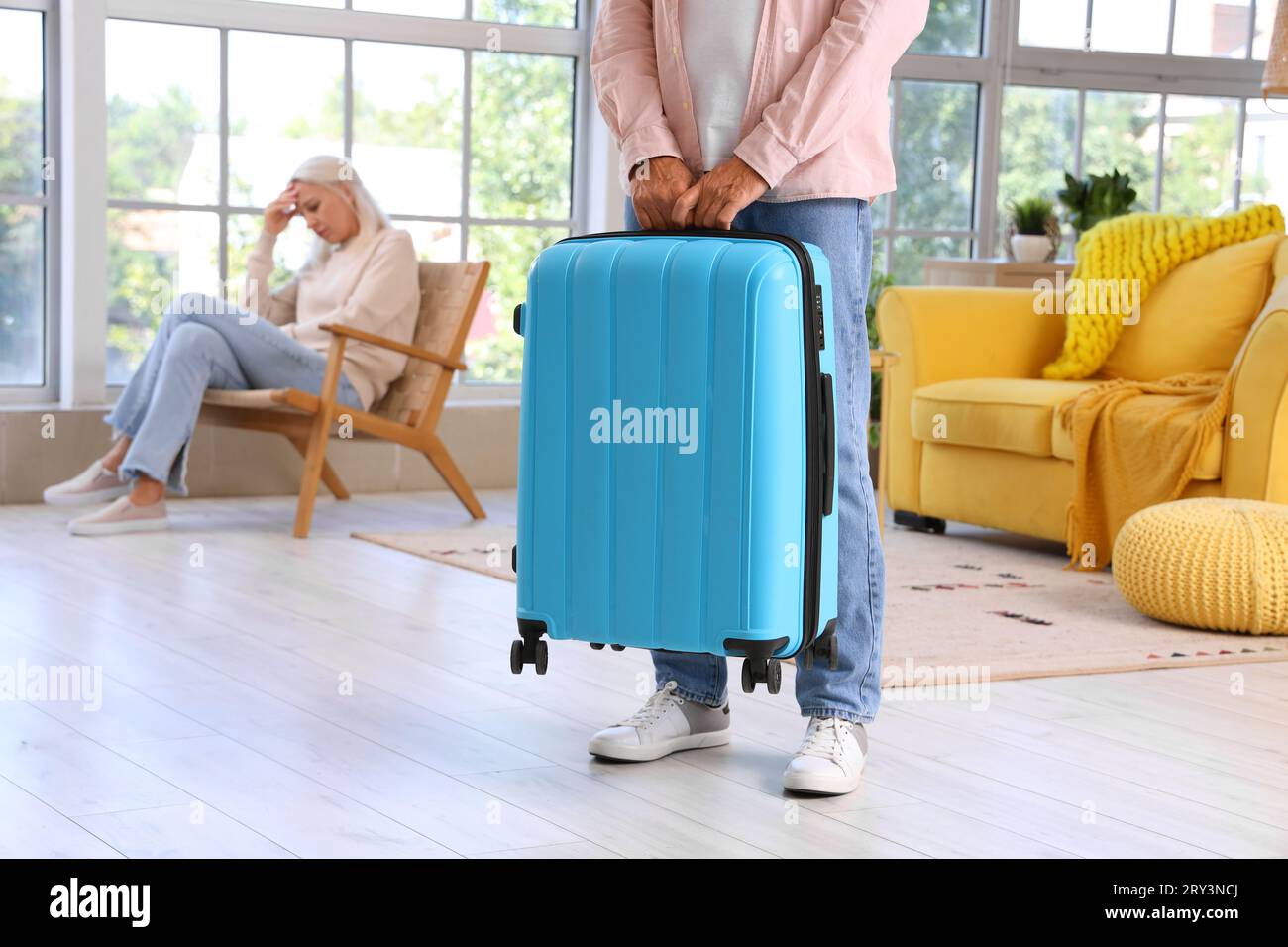 Couple divorce man suitcase sad woman hi-res stock photography and ...