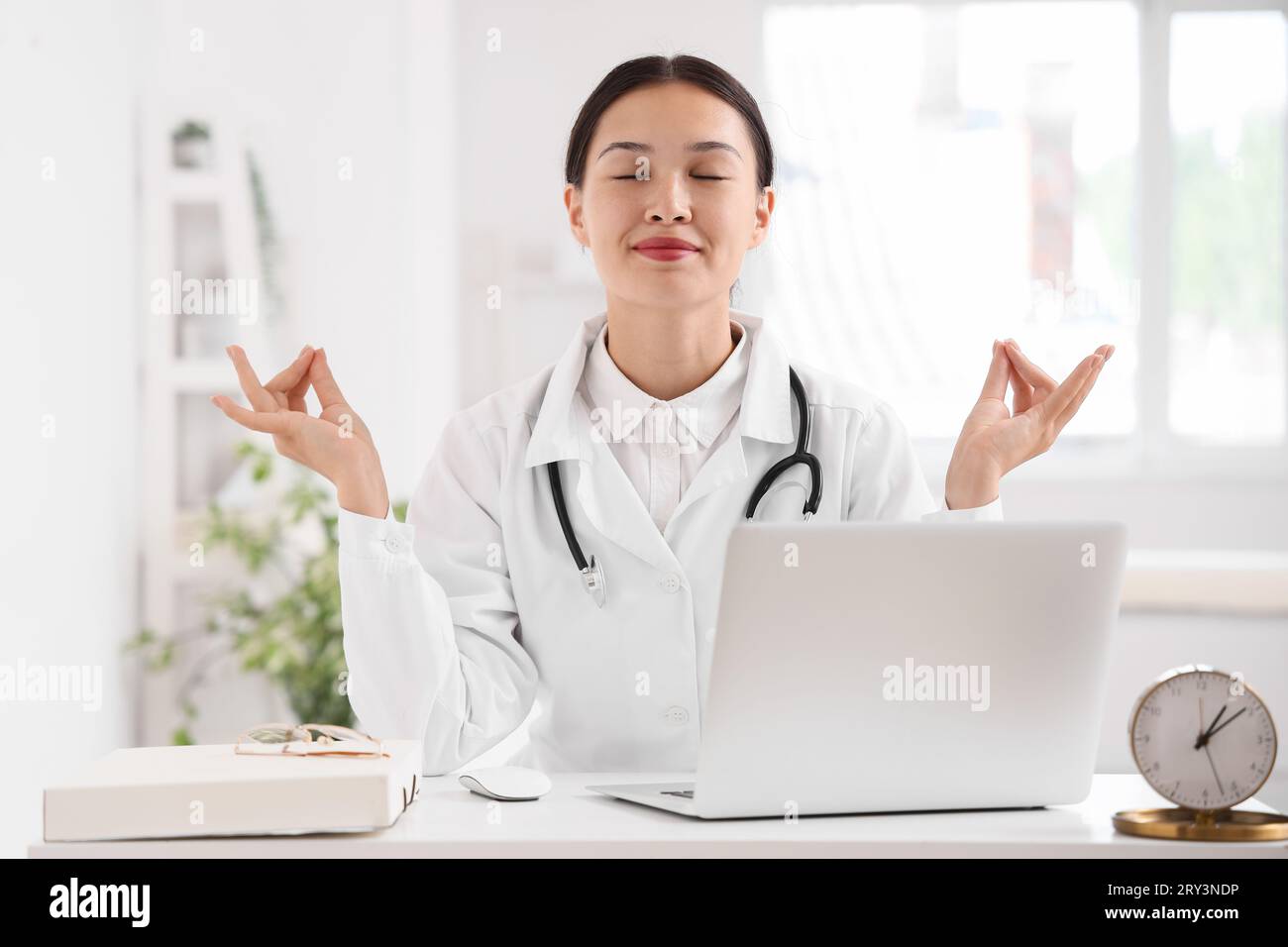 Doctor meditating hi-res stock photography and images - Alamy
