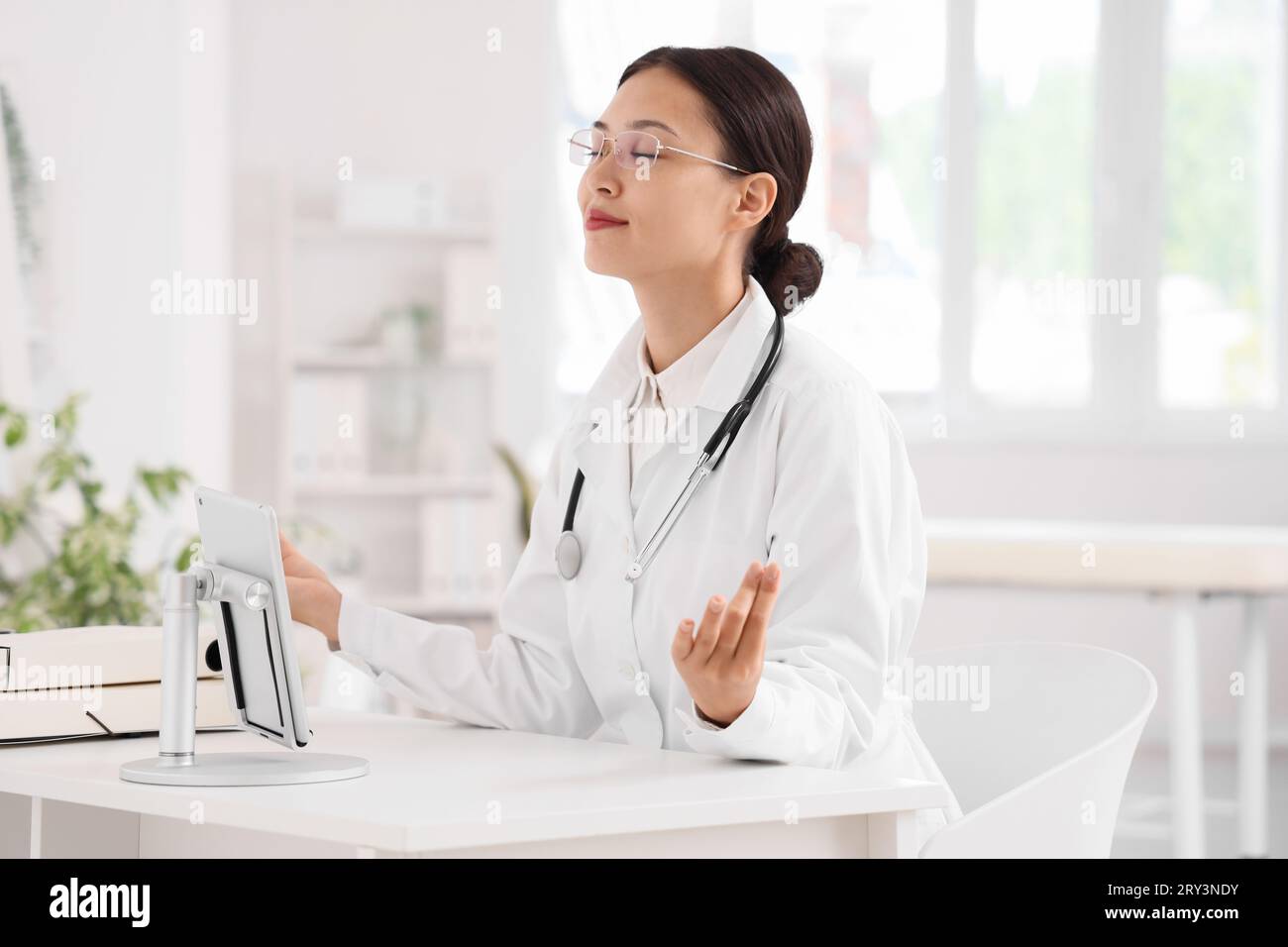 Doctor meditating hi-res stock photography and images - Alamy
