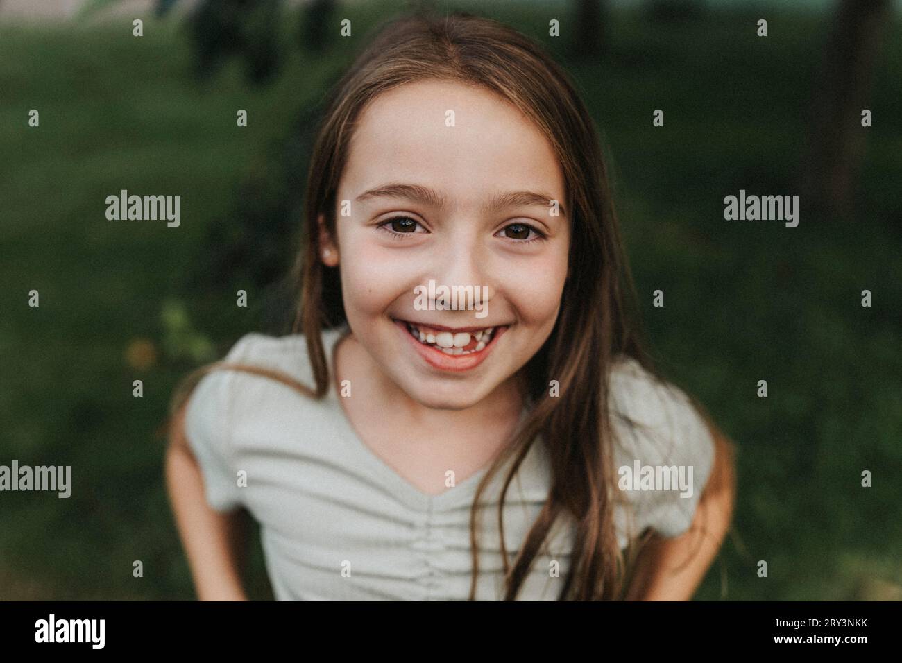 Girl standing outdoors hi-res stock photography and images - Alamy