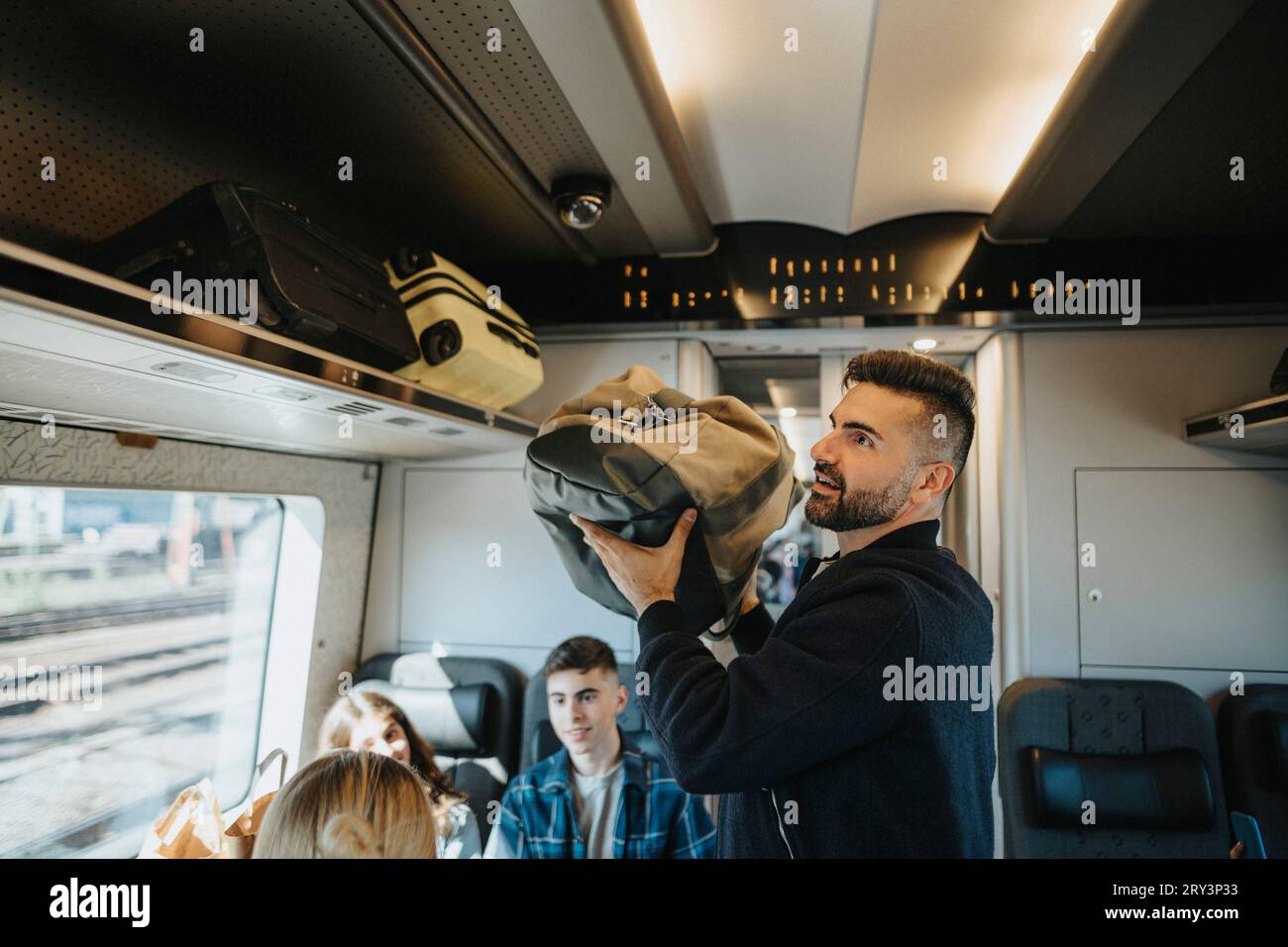 Man loading train hi-res stock photography and images - Alamy
