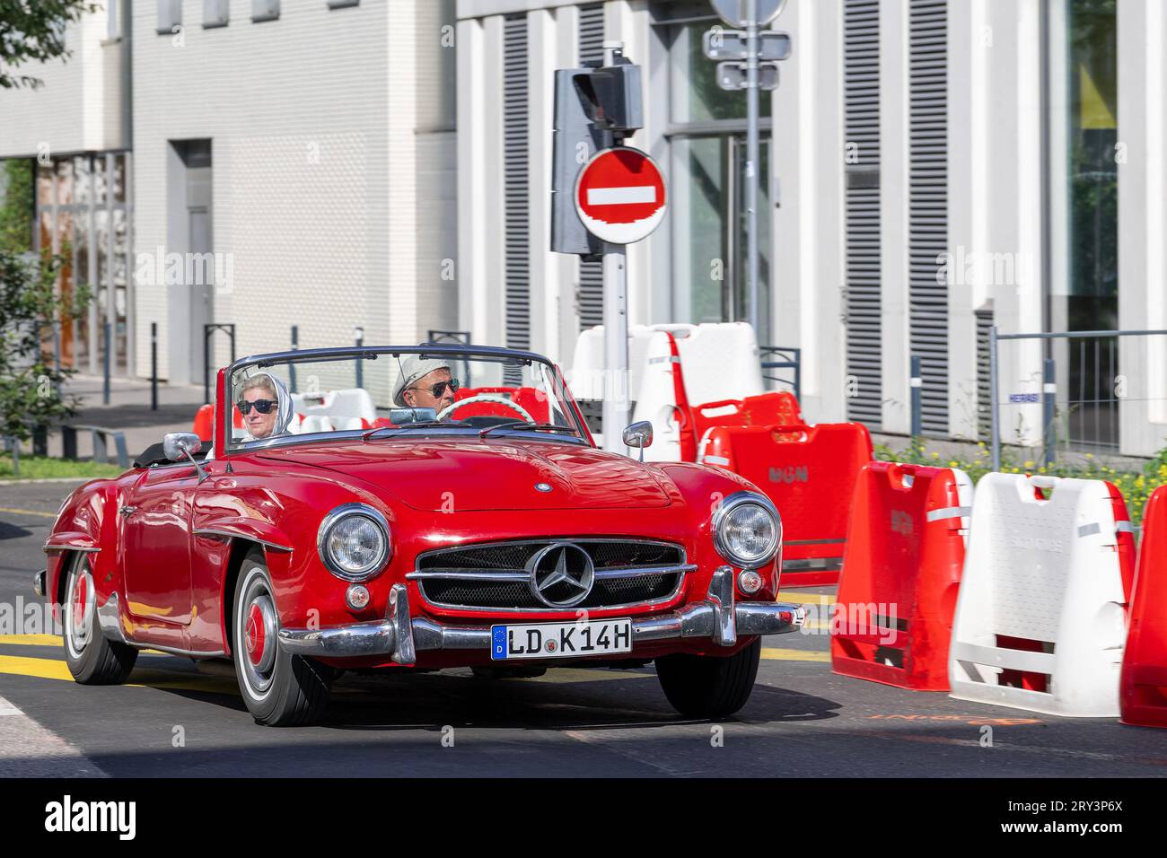 Red Mercedes-Benz 190 SL on the road Stock Photo - Alamy