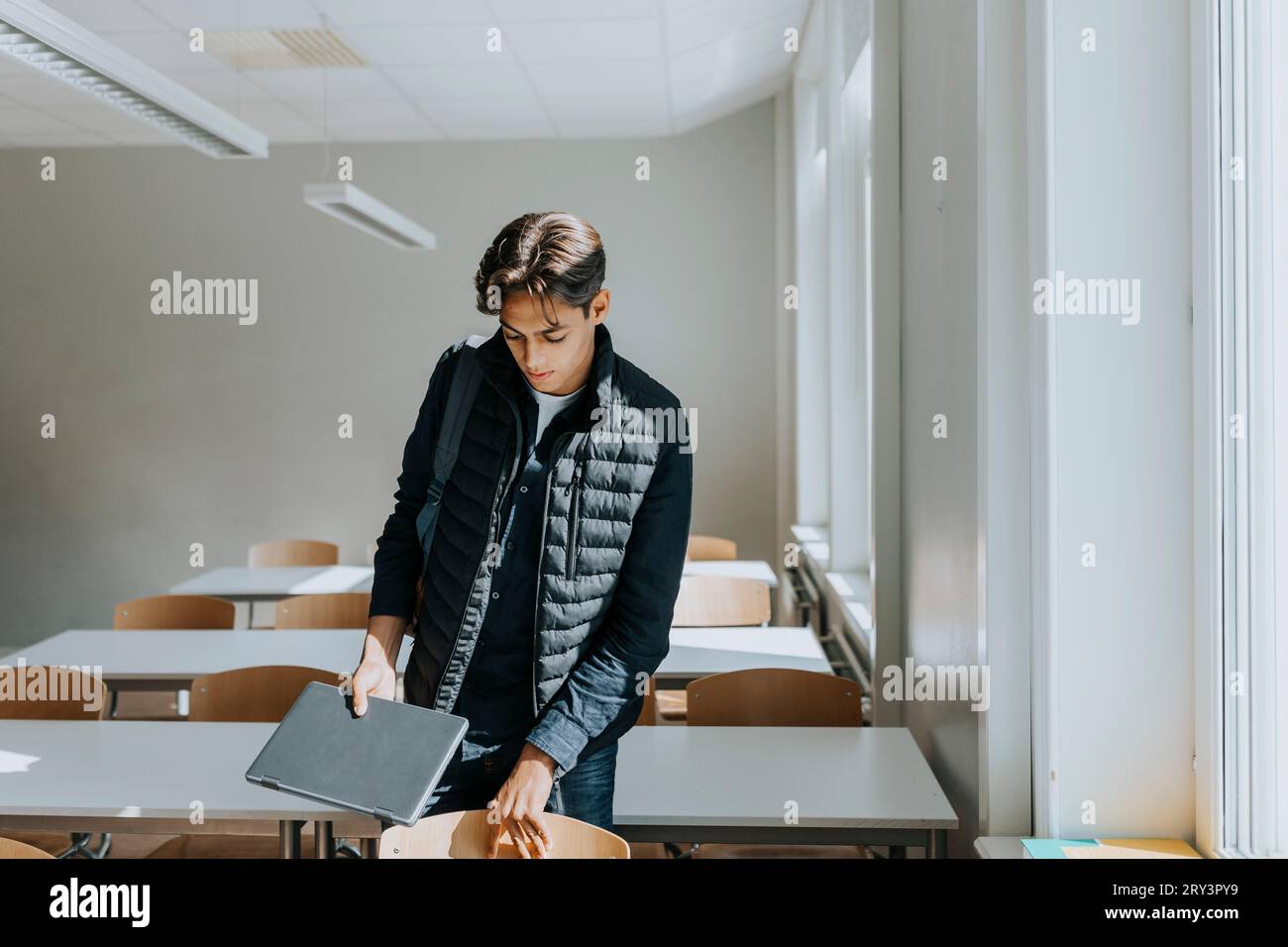 High school boy standing in hi-res stock photography and images - Alamy