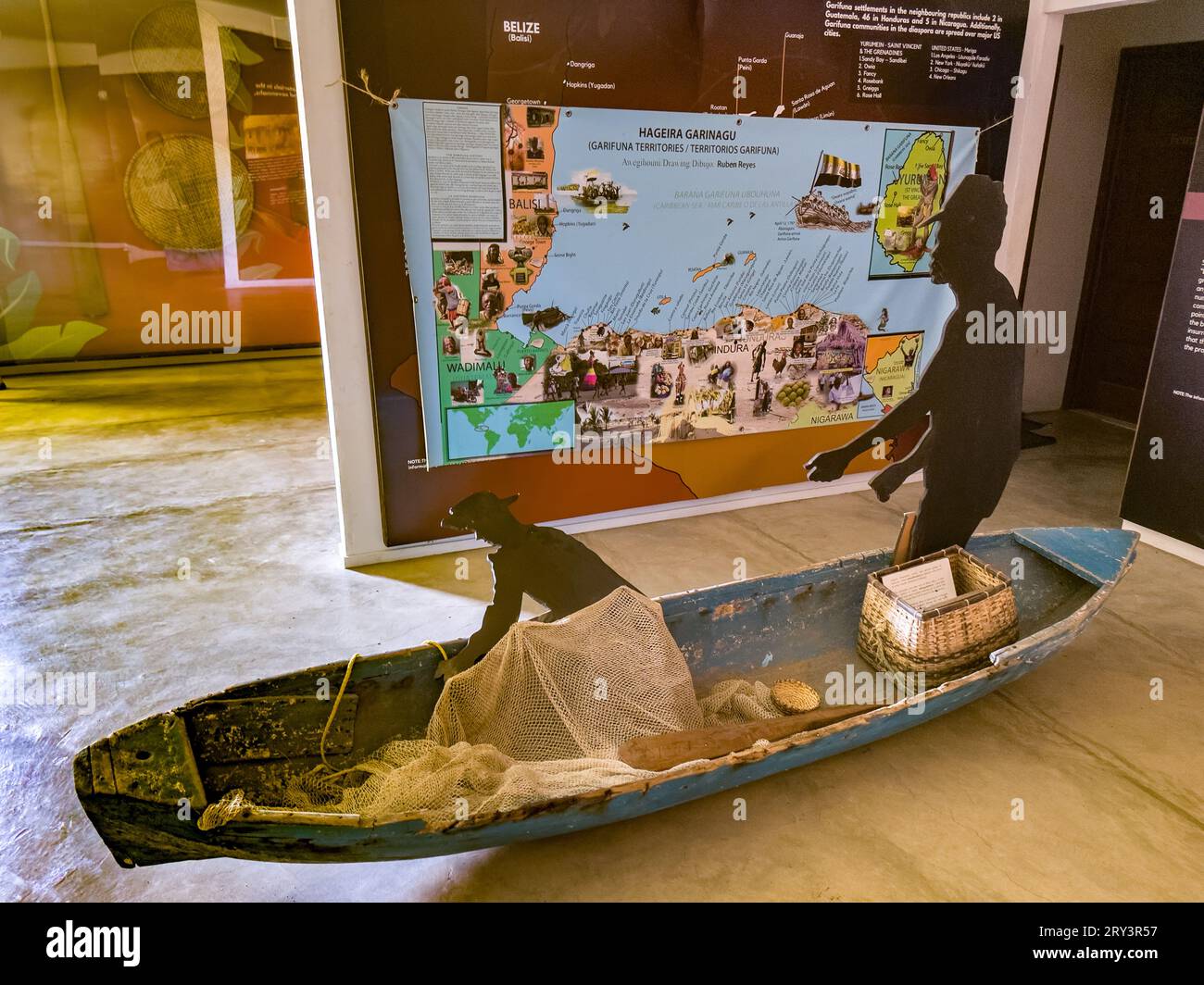 Display of a traditional fishing canoe in Garifuna culture. Gulisi ...