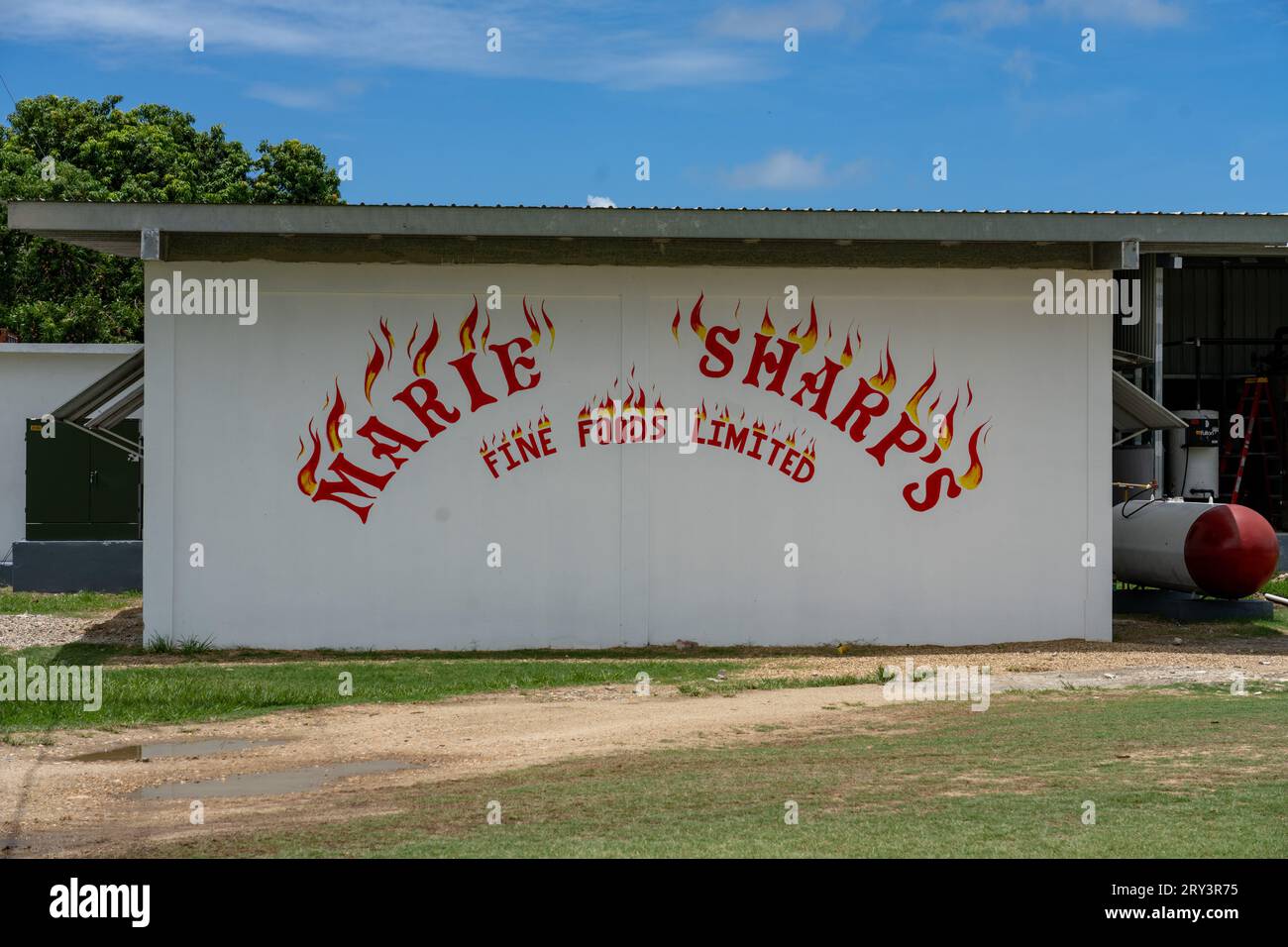Painted sign on the Marie Sharp's pepper sauce food factory near ...