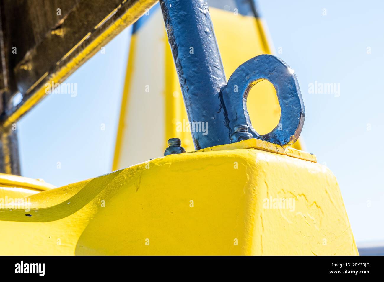 Industrial, metal, yellow construction. Clear, blue sky in the ...