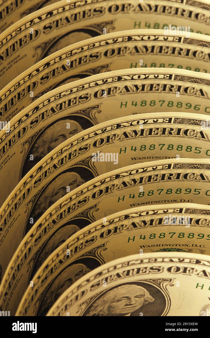 Over view of dollar bills, ten dollar bills, all in patterns ...