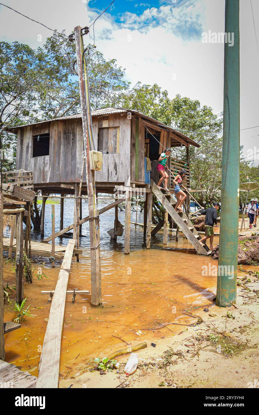 View to Amazon river and traditional house in the Brazilian Rainforest ...