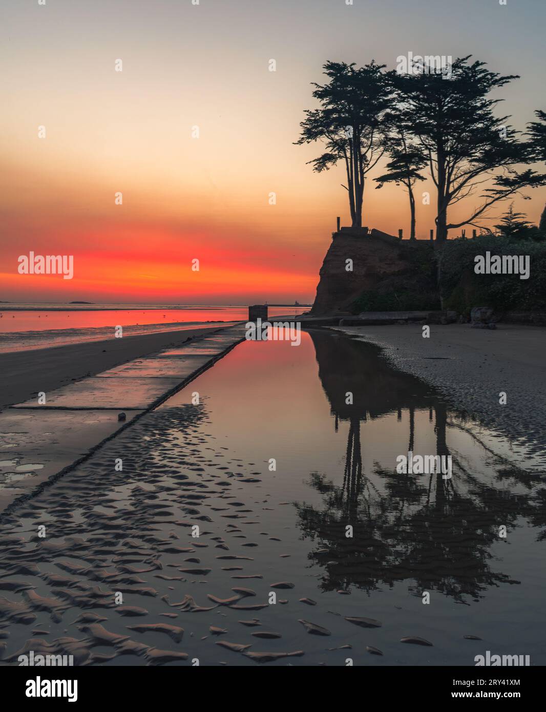 Red sky dawn reflections on Burrow Beach caused by saharan dust in the ...