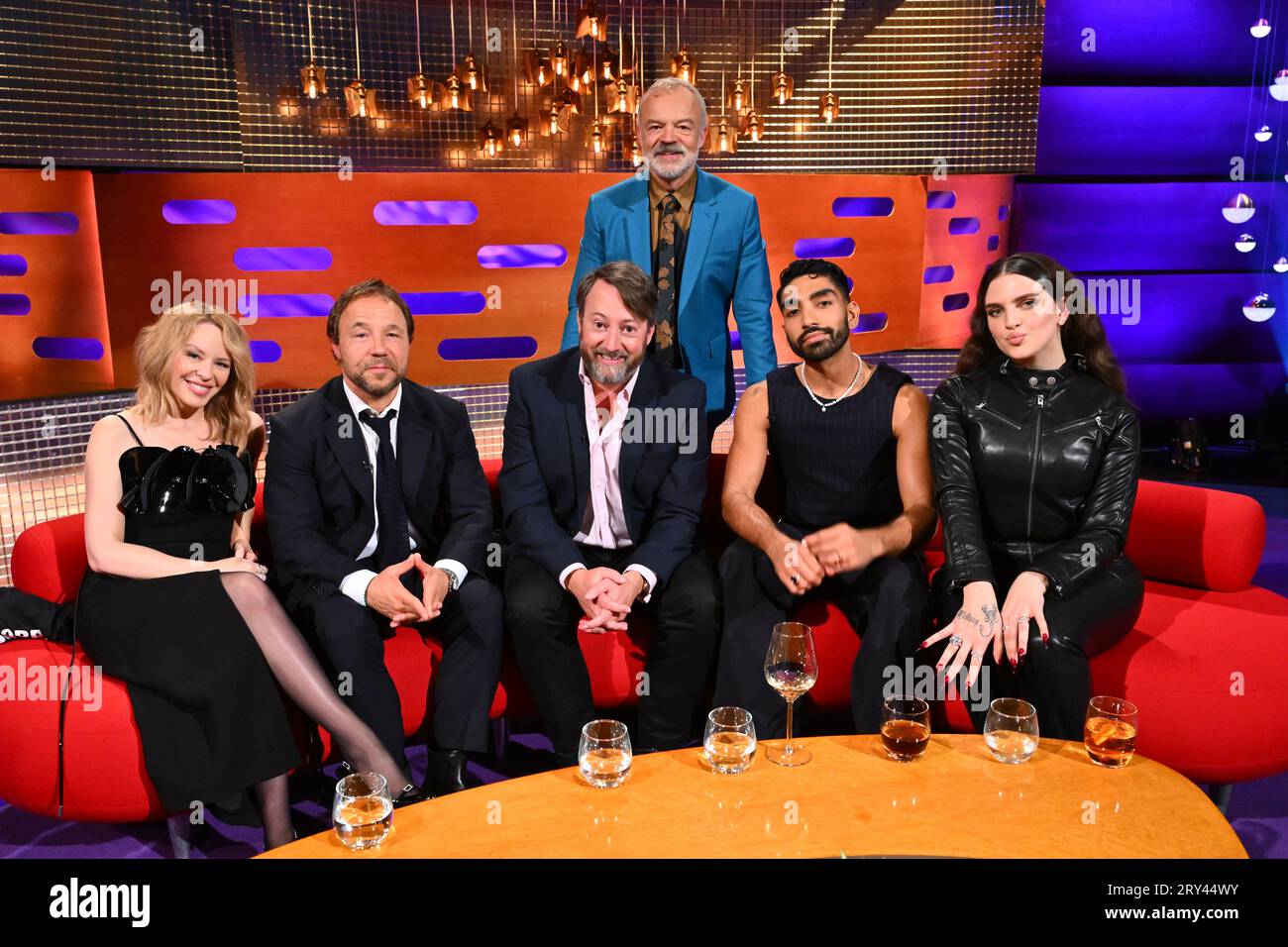 EDITORIAL USE ONLY Host Graham Norton with (front row left to right) Kylie Minogue, Stephen ...