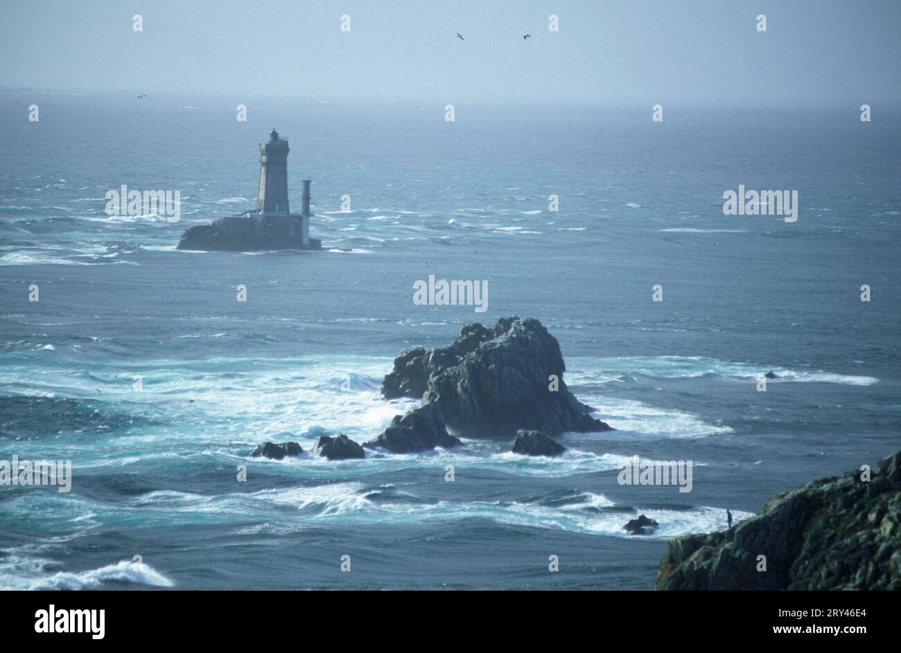 Lighthouse on little island, Pointe du Raz, Brittany, France ...