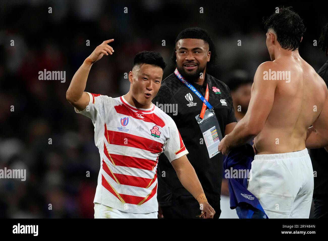 Japan's Naoto Saito celebrates with teammate after the end of the ...