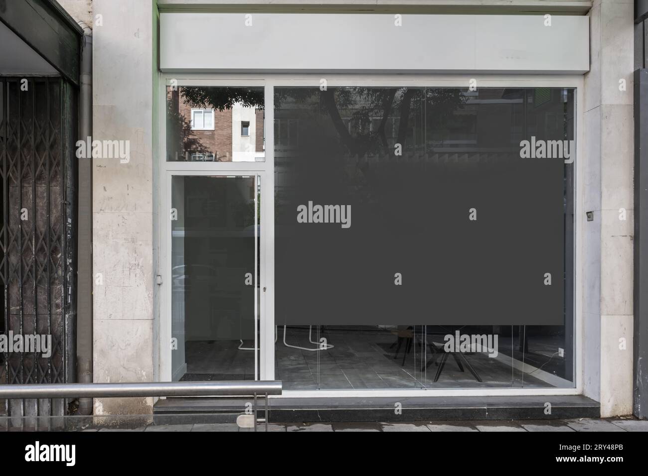 Facade of commercial premises at street level Stock Photo - Alamy