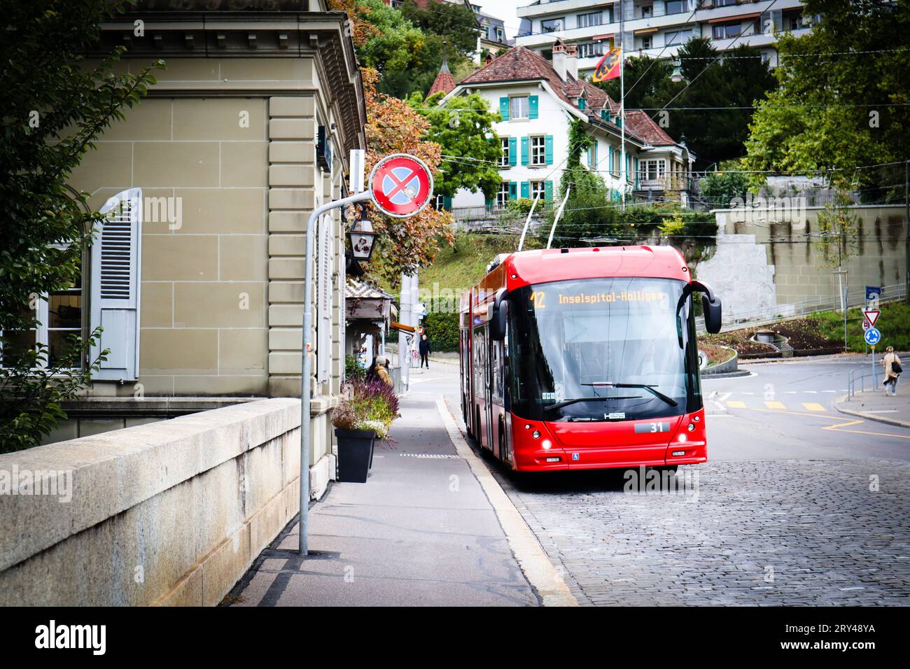 Red bus in Bern, Switzerland Stock Photo - Alamy