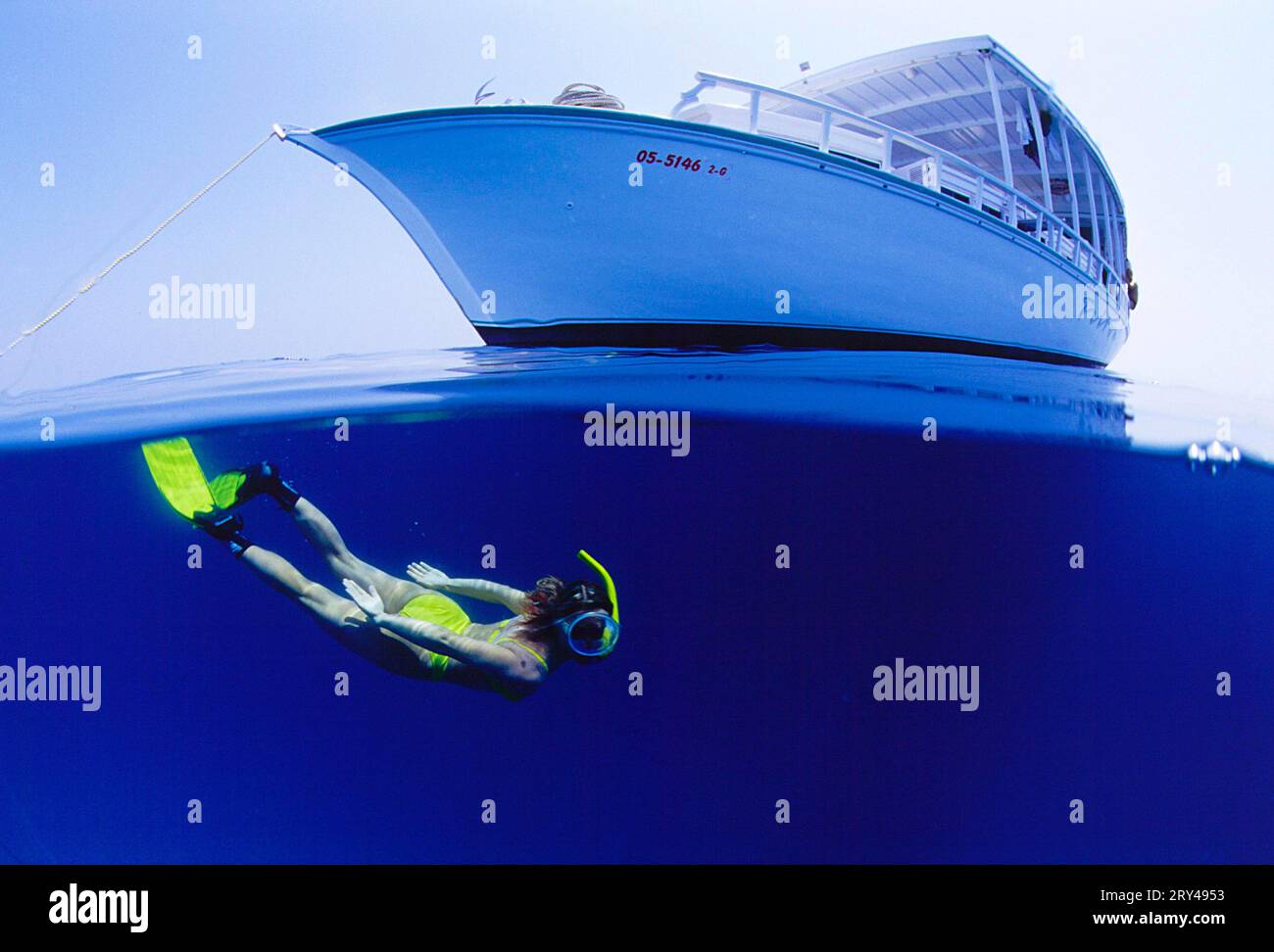 Snorkler under yacht, Maldives, snorkeler under yacht, Asia, underwater ...