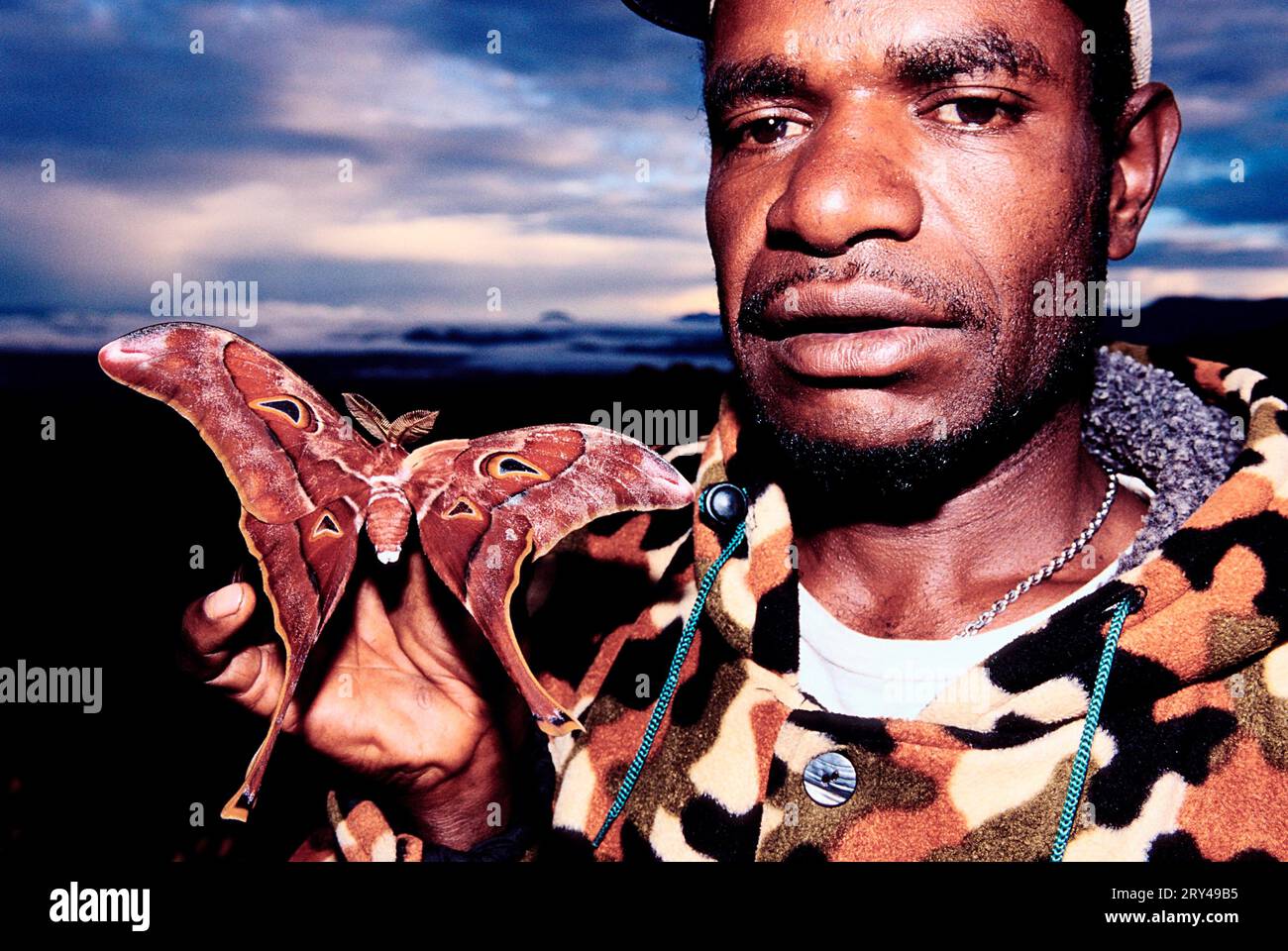 Man with butterfly, Papua New-Guinea, Man with butterfly, Asia ...