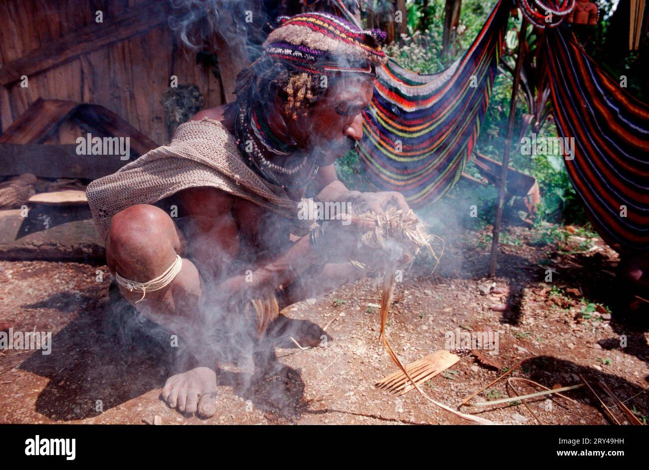 Huli man making fire, Tari, Papua New-Guinea, Huli man making fire ...