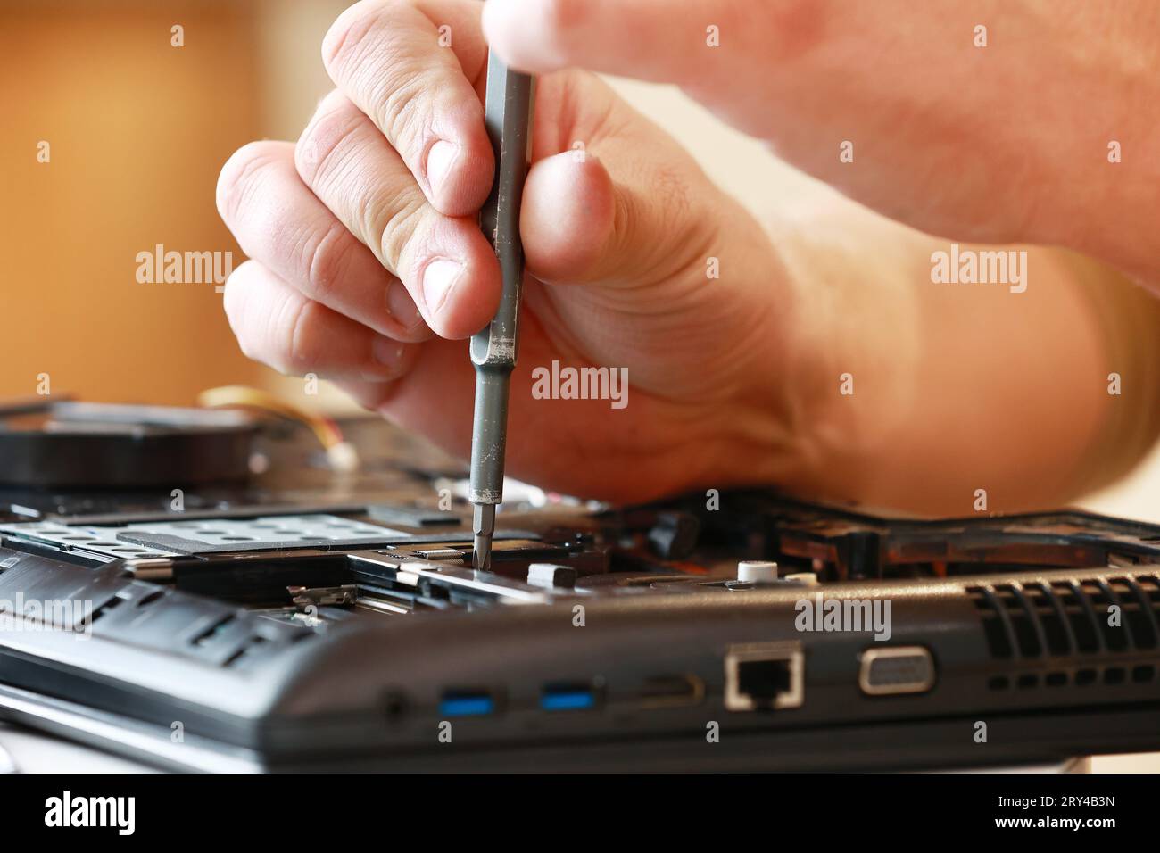 Man servicing electronic motherboard hi-res stock photography and ...