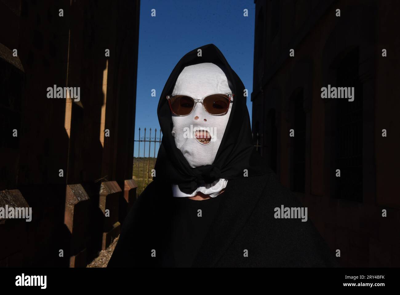 September 23, 2023, LuzÃ³n, Spain: A woman with her face covered with a ...
