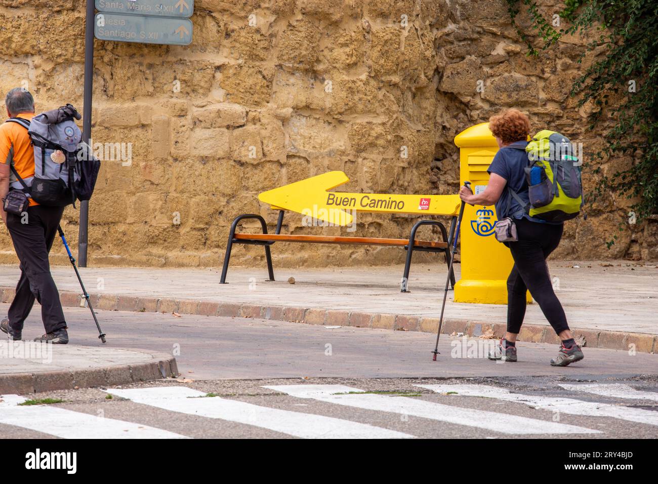 Pilgrims walking the Camino de Santiago, the way of St James pilgrimage ...