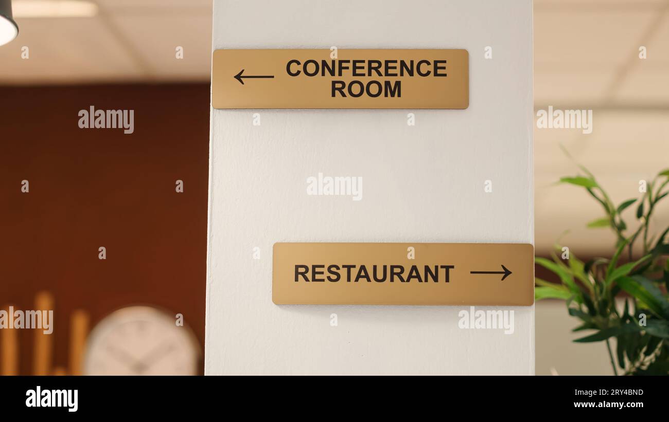 Close up of directions signs to restaurant, conference room and spa ...