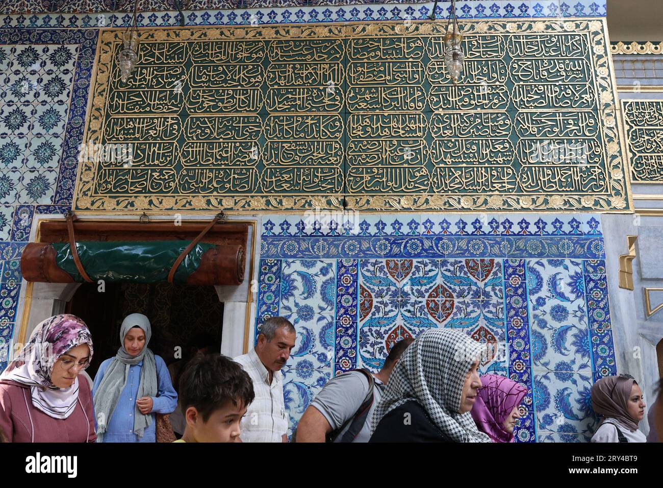 The tiled wall with Quranic script at the Eyüp Sultan tomb at the Eyüp ...