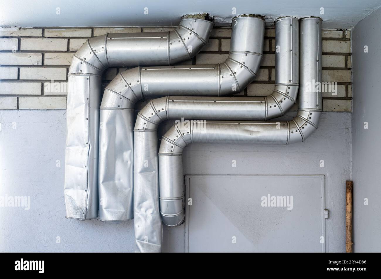 Old aluminum tubes of the ventilation system installation Stock Photo ...
